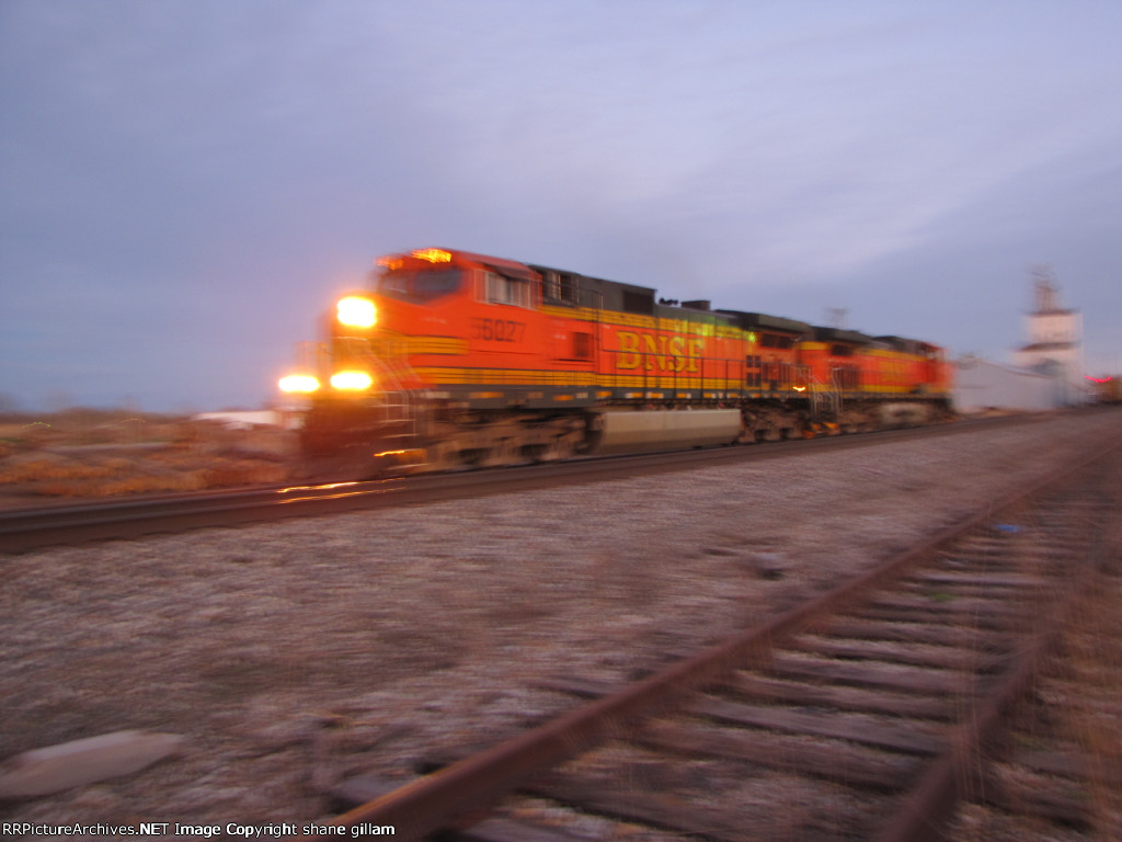 BNSF 5027 leads the local out of old monroe bad pic.